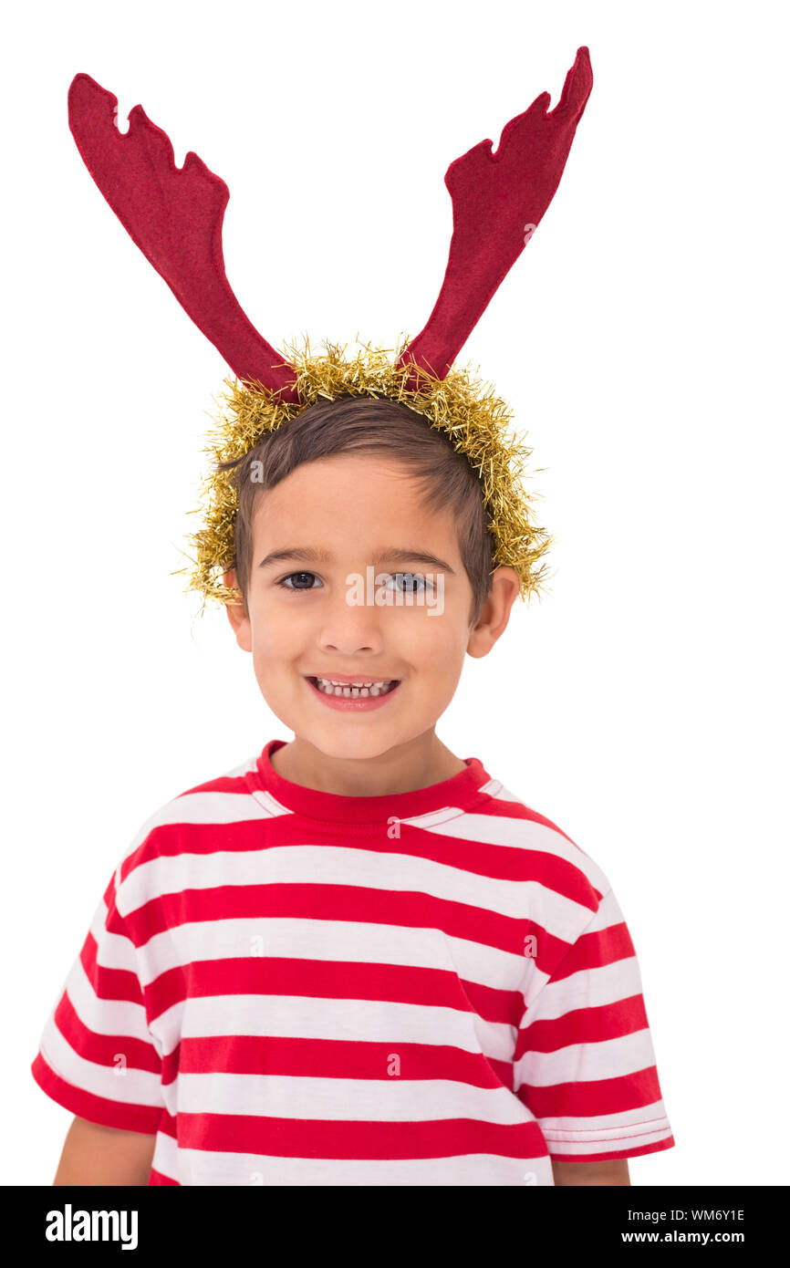Cute little boy wearing antlers on white background Stock Photo - Alamy