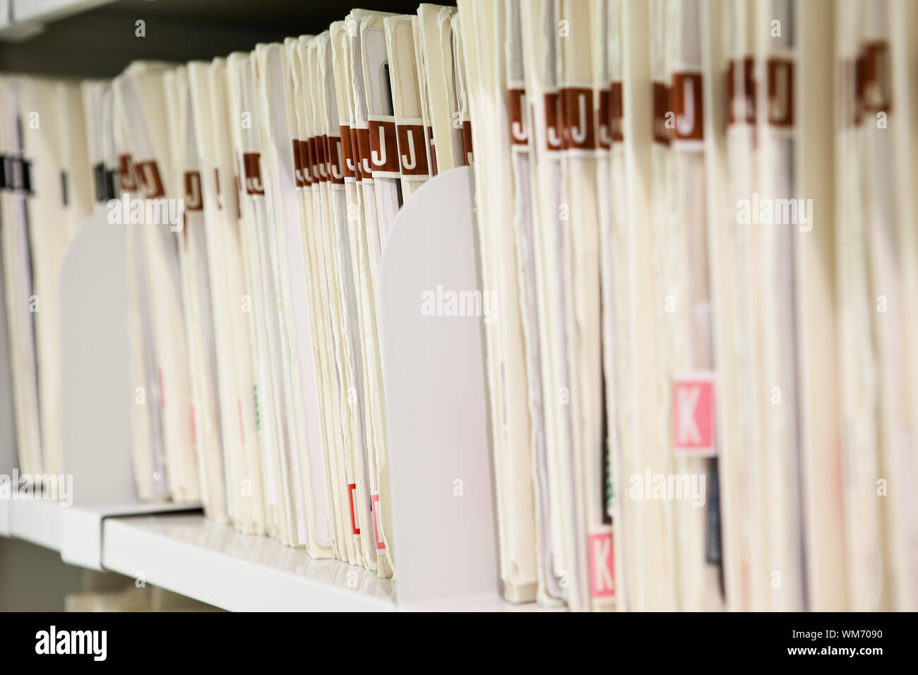 Files organized on shelf Stock Photo - Alamy