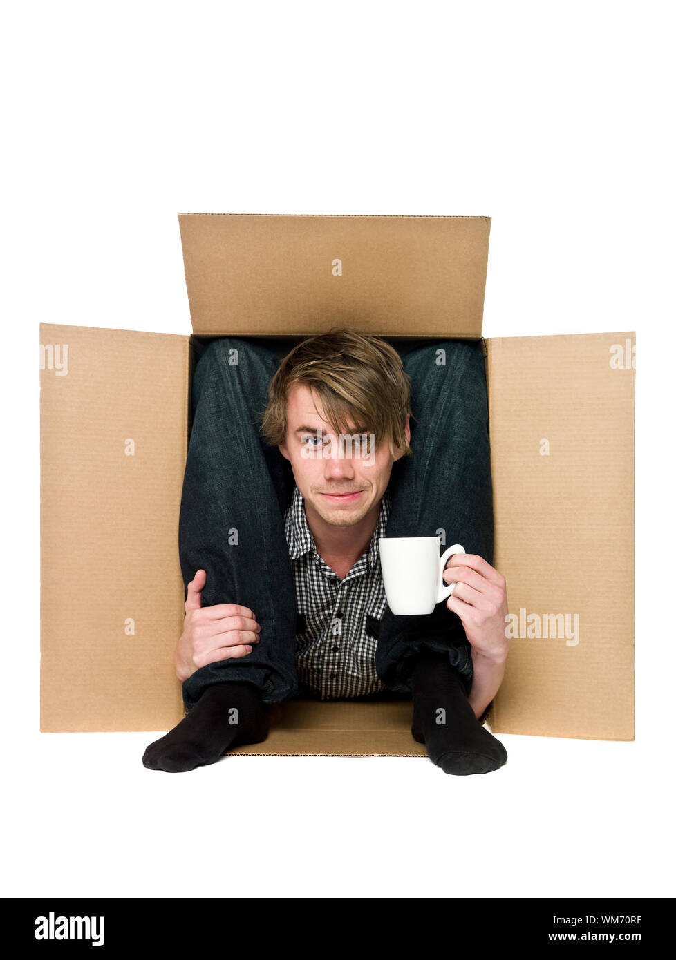 Acrobat inside cardboard box hi-res stock photography and images - Alamy