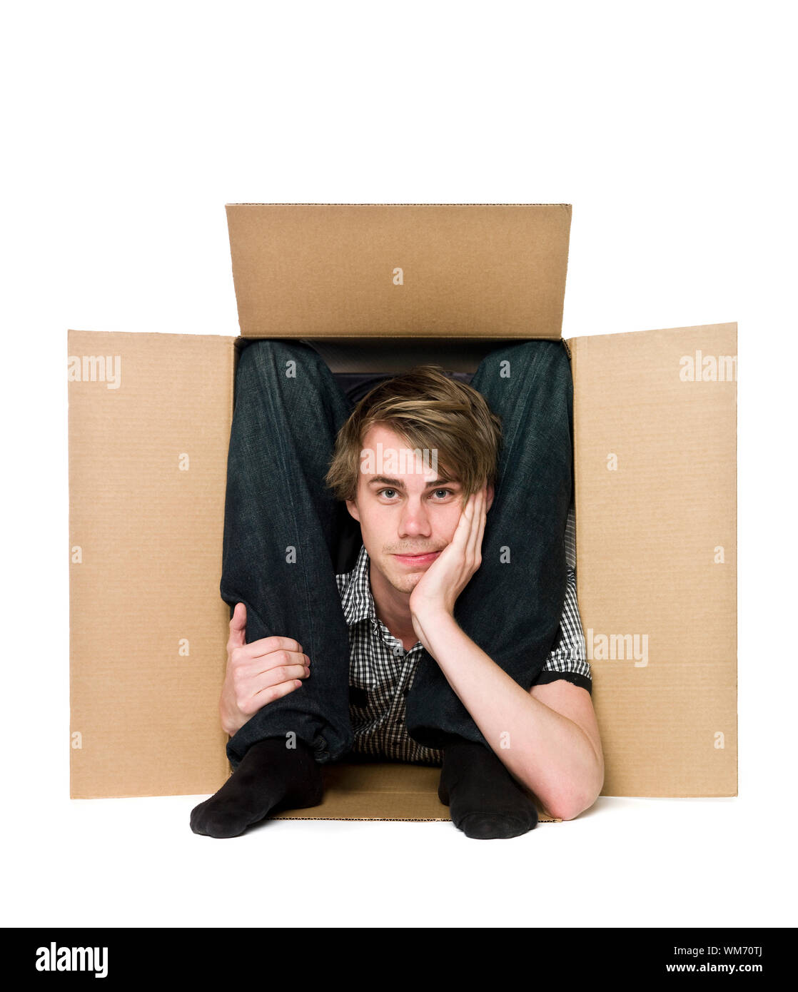 Acrobat inside cardboard box hi-res stock photography and images - Alamy