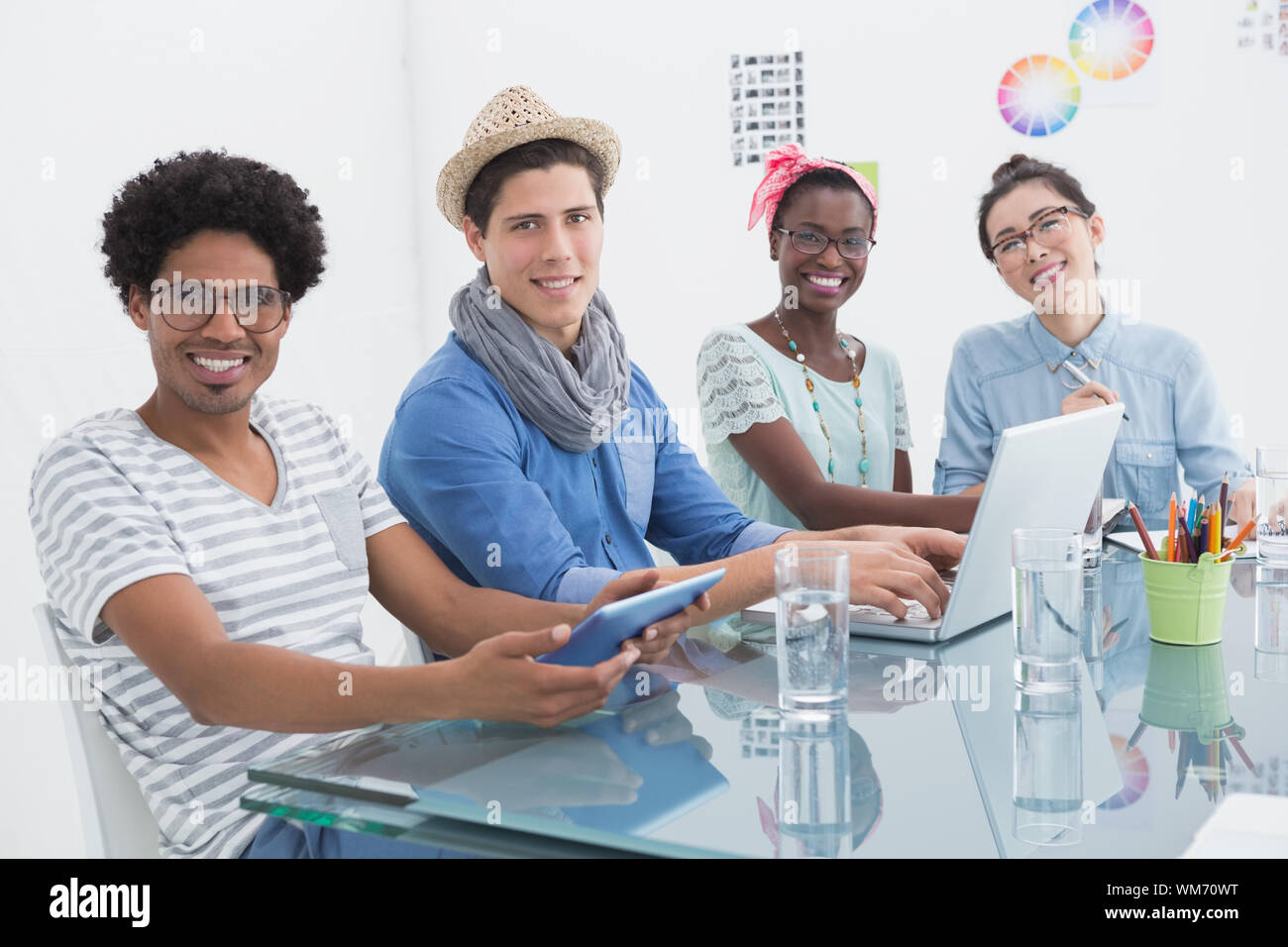 Young creative team having a meeting in creative office Stock Photo - Alamy