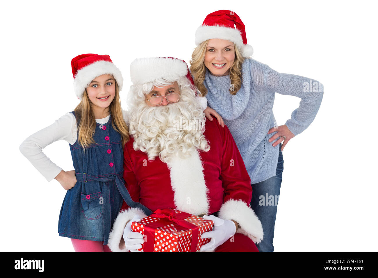 Mother and daughter with santa claus on white background Stock Photo ...