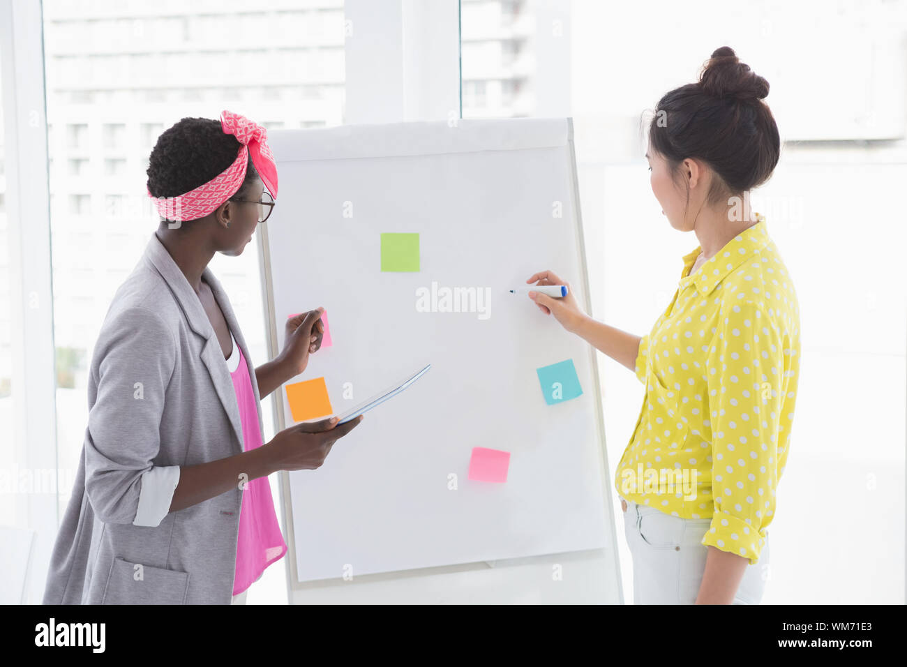 Young creative women brainstorming together in creative office Stock ...