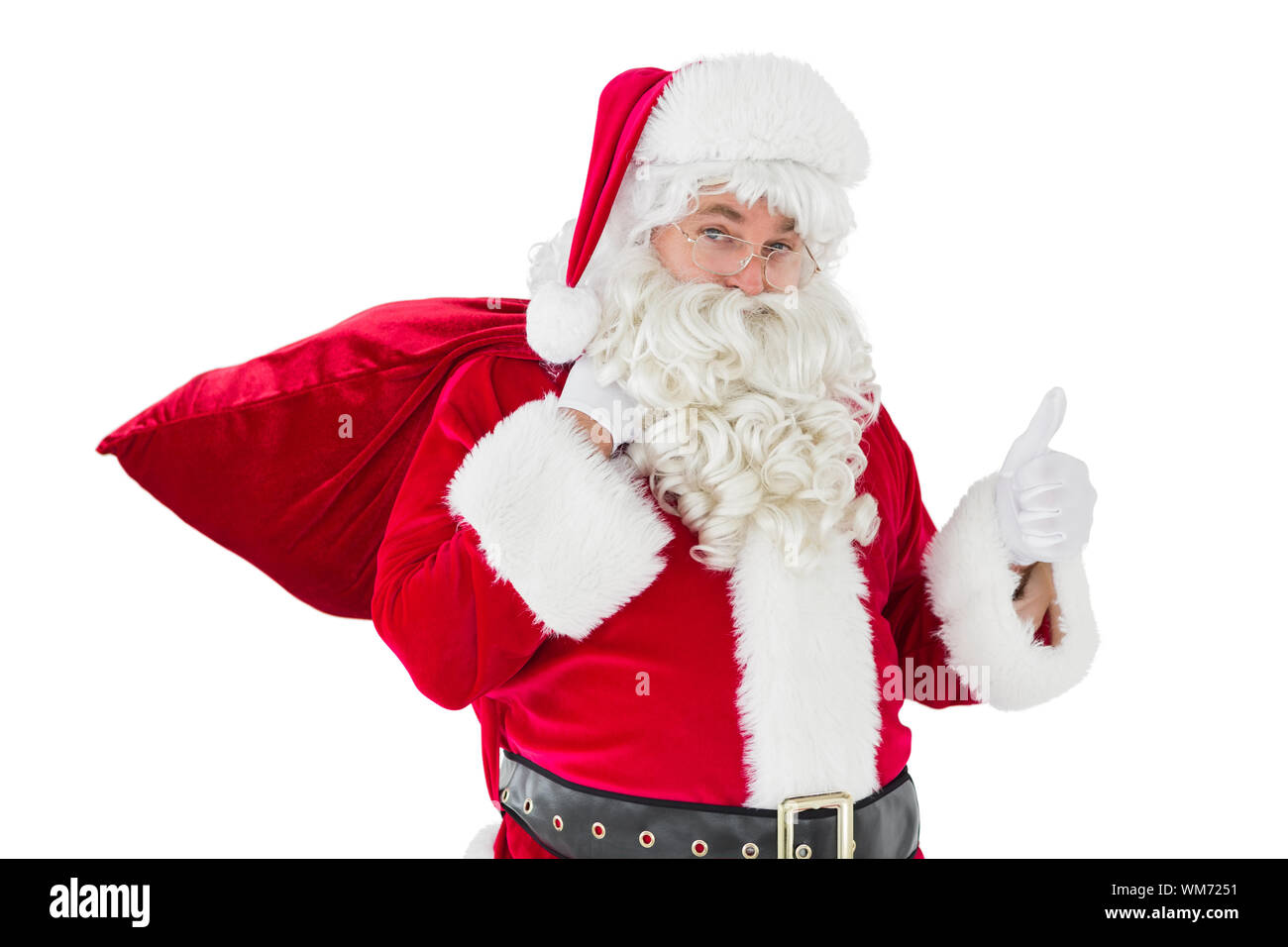 Santa claus with his sack and thumbs up on white background Stock Photo ...