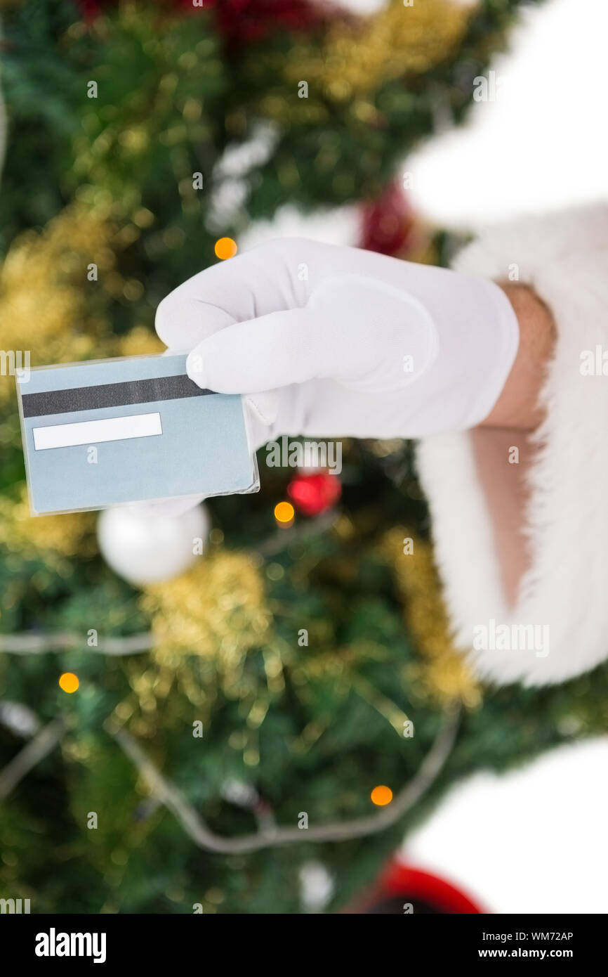 Hand of santa holding credit card on white background Stock Photo - Alamy