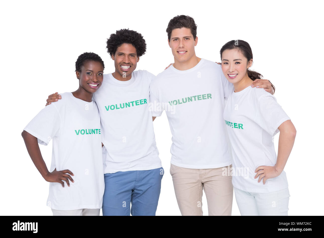 Young smiling volunteers looking at camera on white background Stock ...