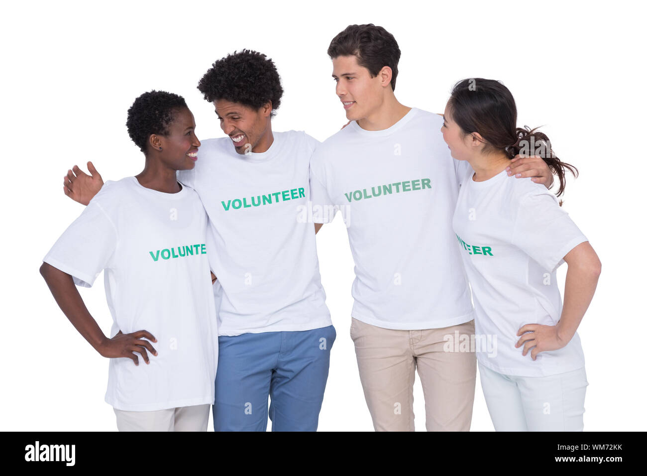 Young smiling volunteers looking at camera on white background Stock ...