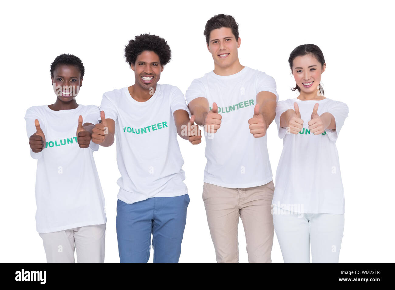 Young smiling volunteers looking at camera on white background Stock ...