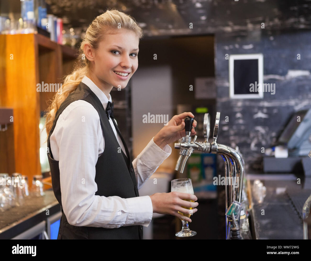 Pulling the tap hi-res stock photography and images - Alamy