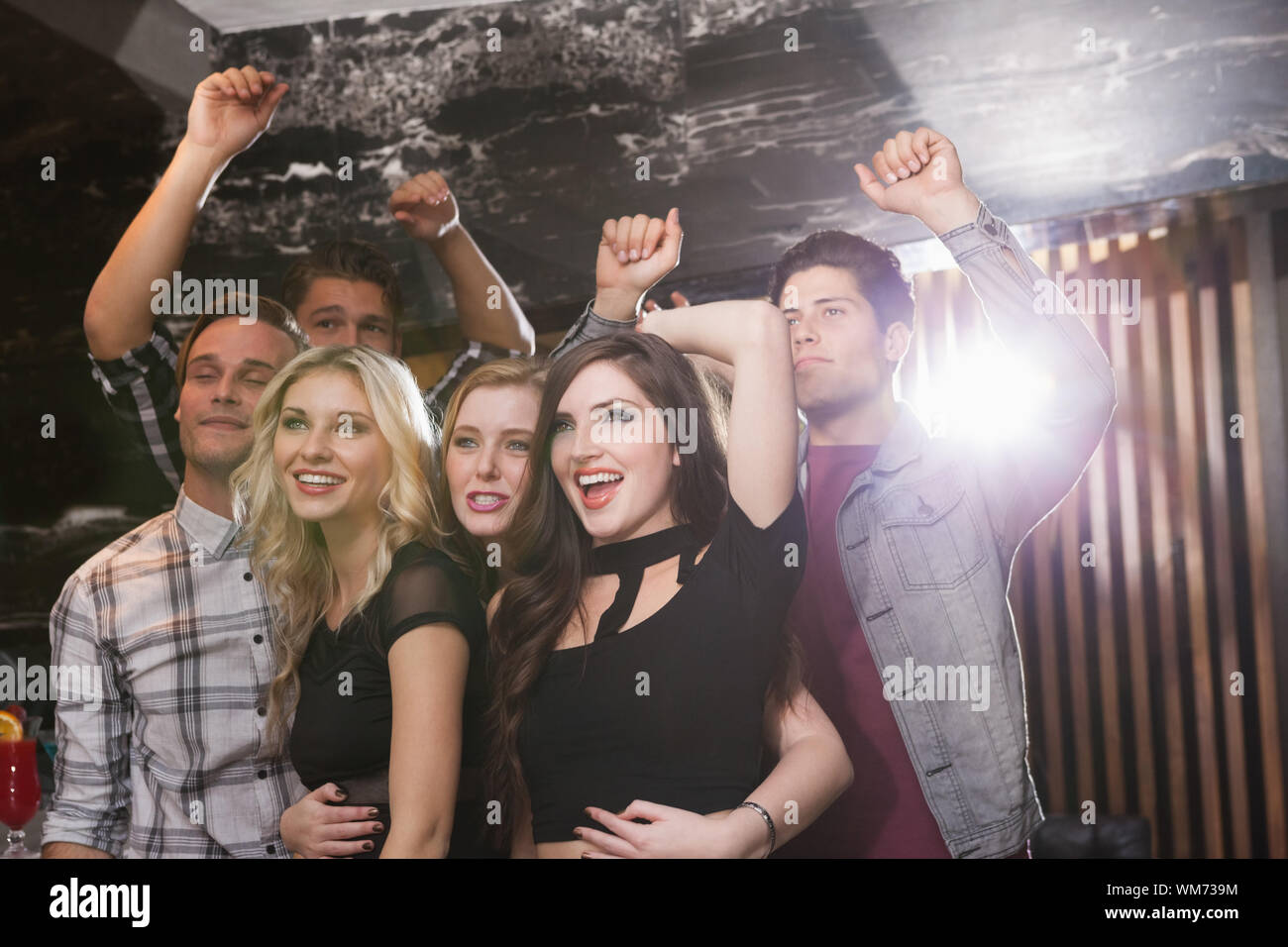 Happy friends having fun together at the nightclub Stock Photo - Alamy