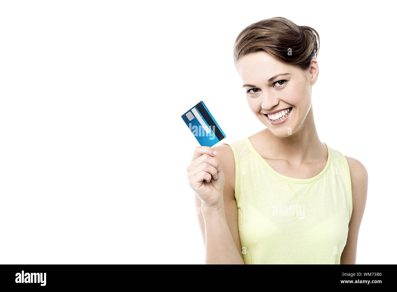 Beautiful woman showing her new credit card Stock Photo - Alamy