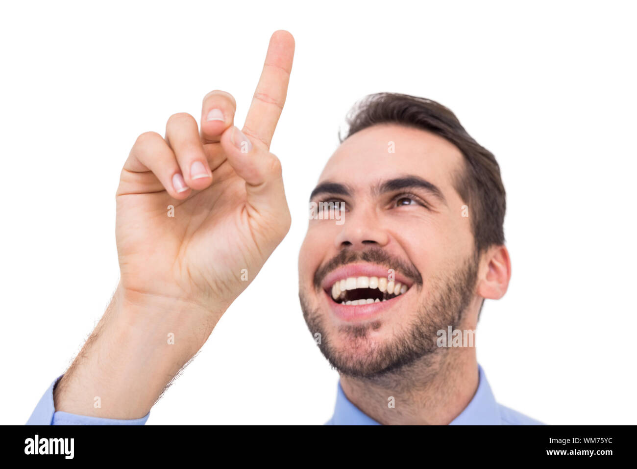 Happy businessman pointing something up on white background Stock Photo ...