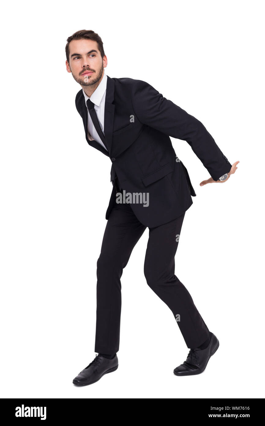 Businessman carrying something with his hands on white background Stock ...