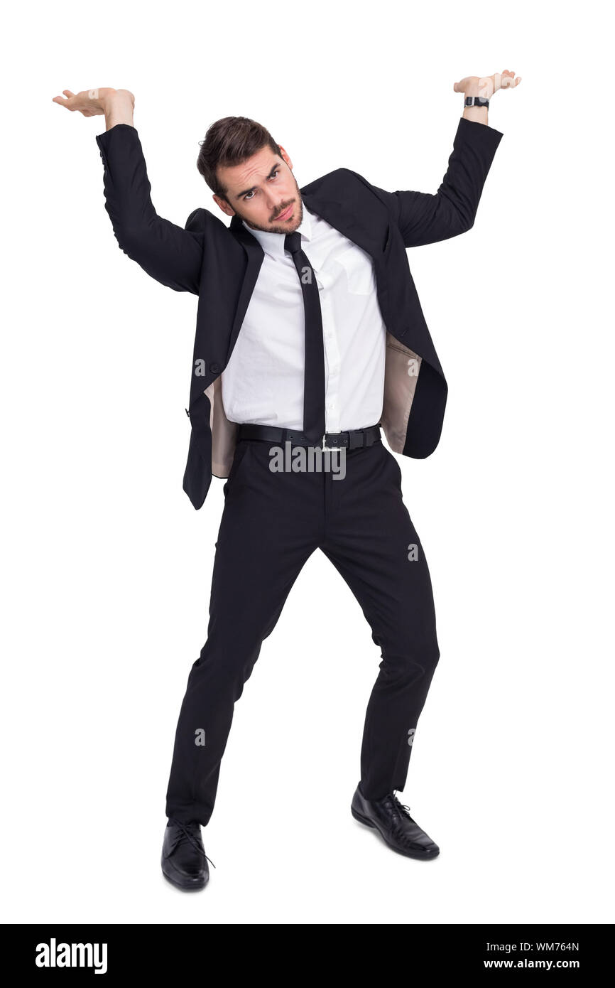 Businessman in suit lifting up something heavy on white background ...