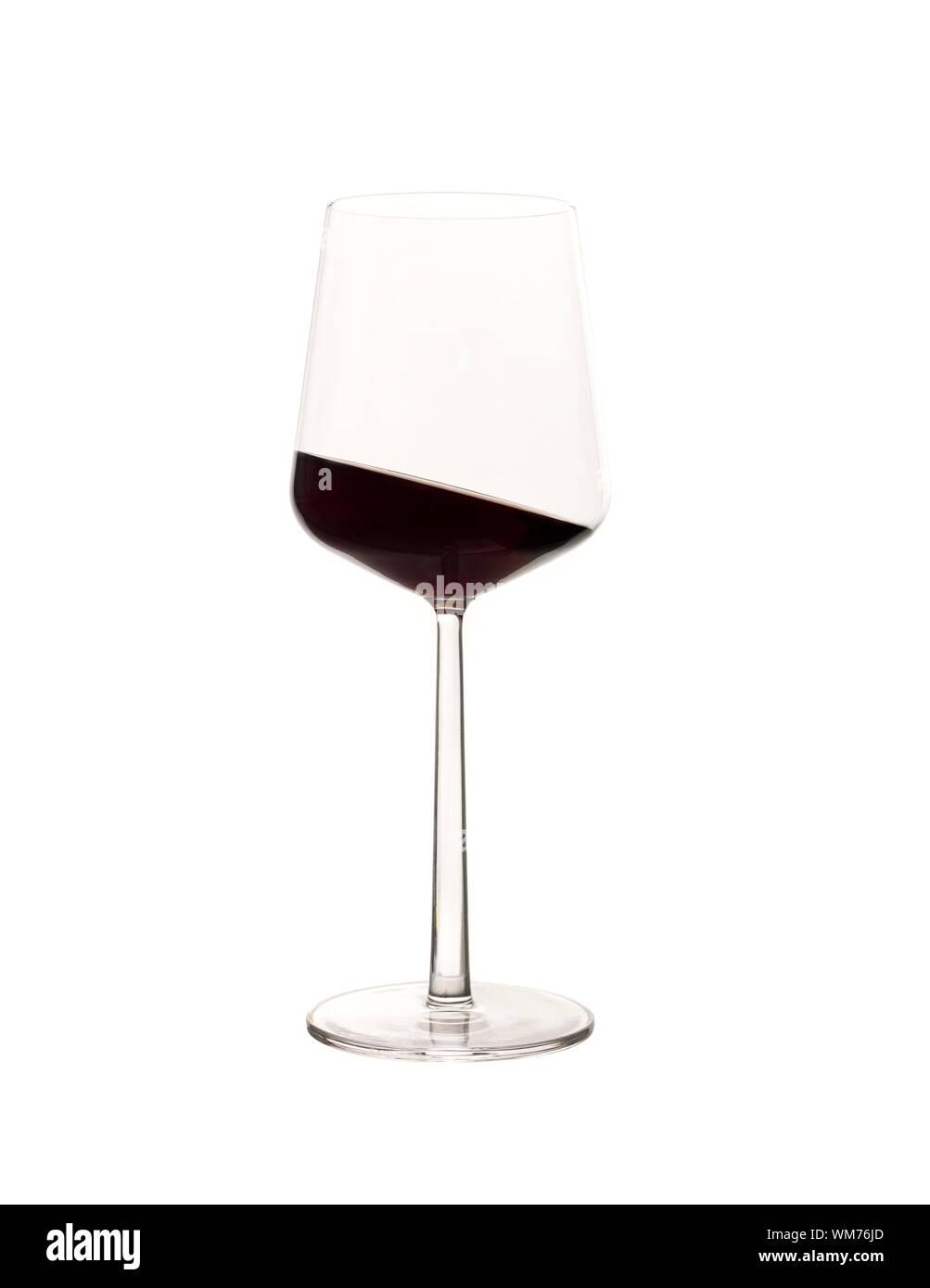 An Asquint glass of red wine Stock Photo - Alamy