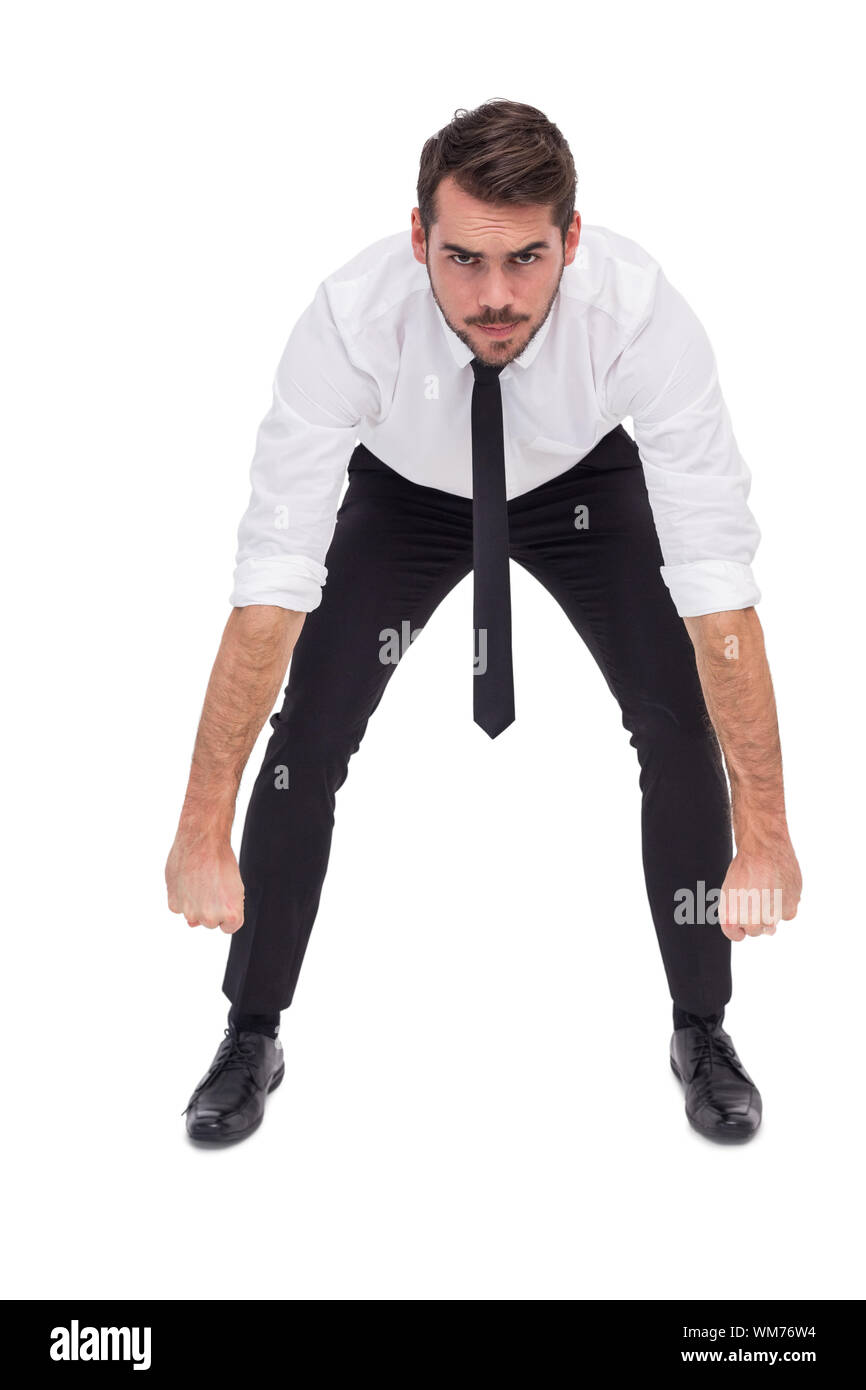 Elegant businessman lifting up something heavy on white background ...