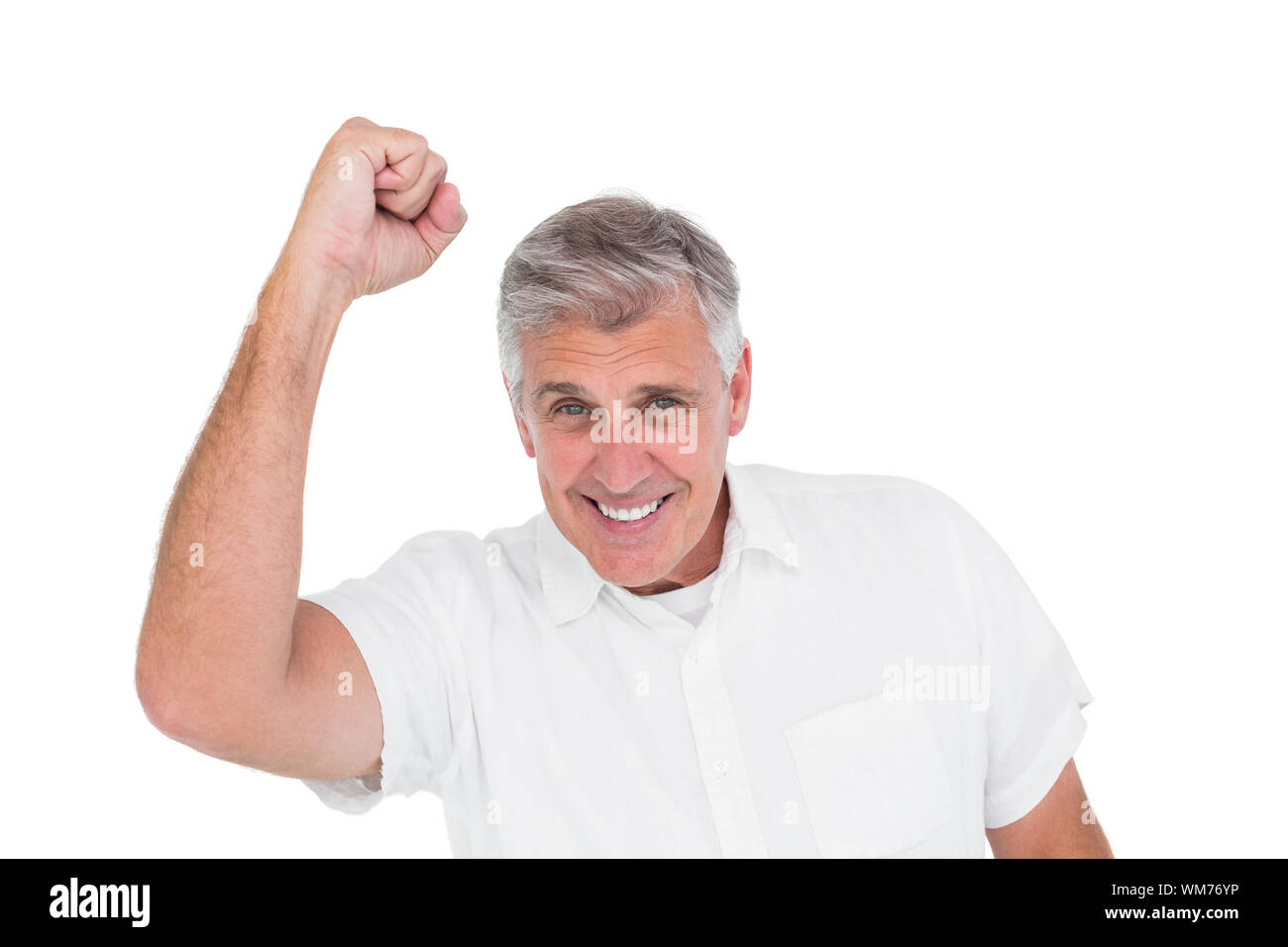 Casual man cheering at camera on white background Stock Photo - Alamy
