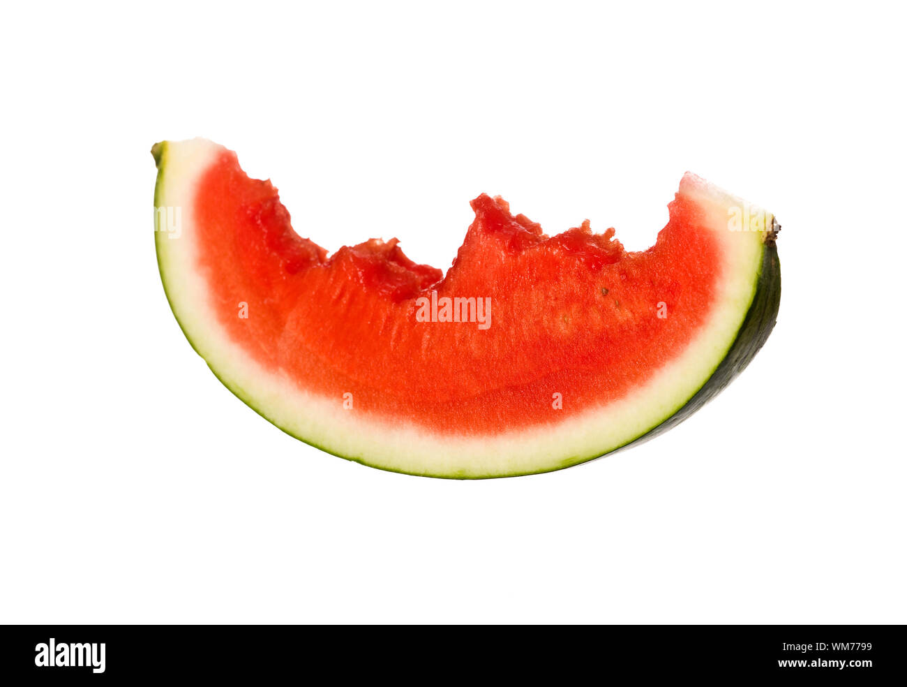 Sliced Watermelon with a few bites taken Stock Photo - Alamy