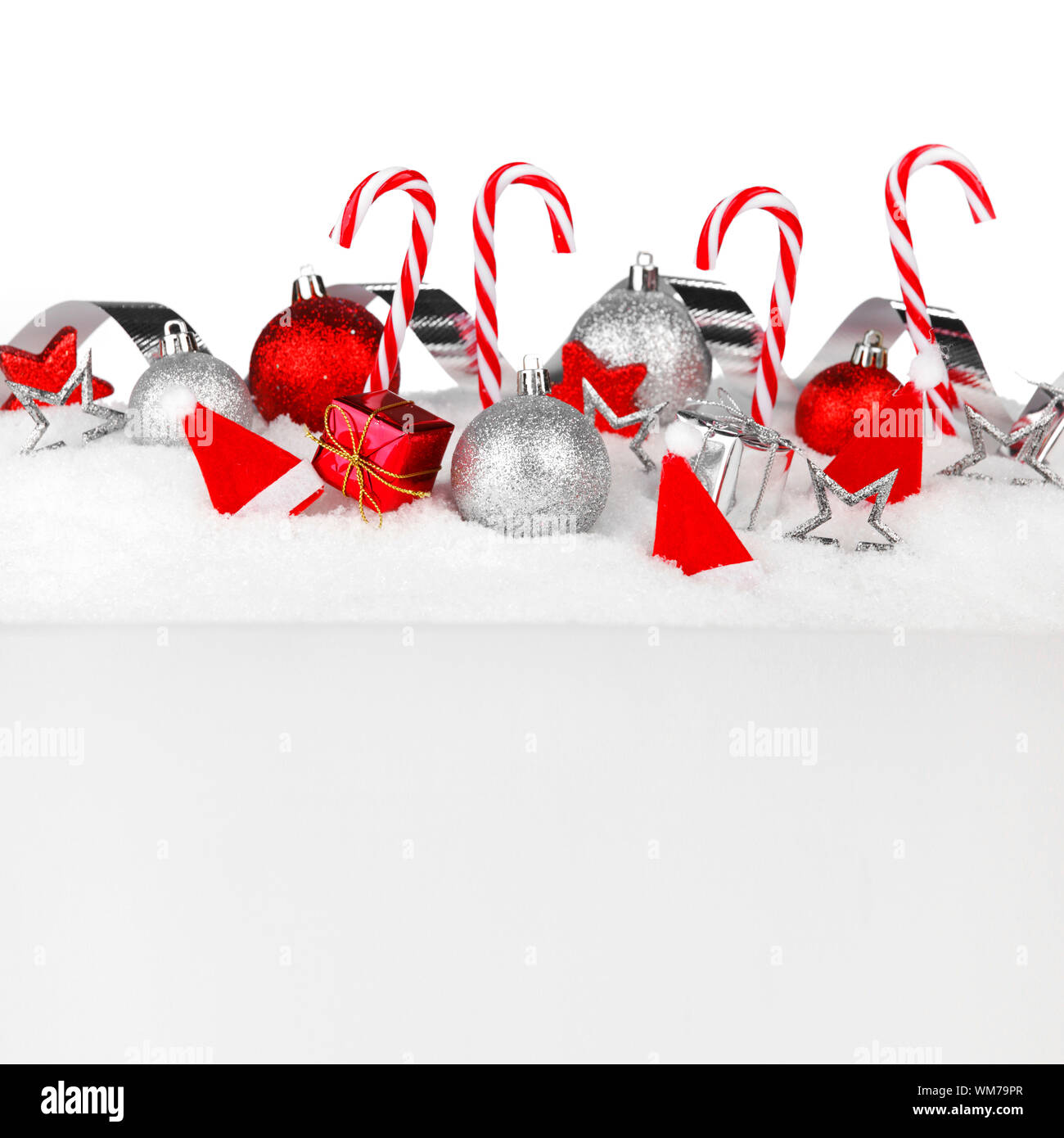 Beautiful red and silver christmas decor on snow Stock Photo - Alamy