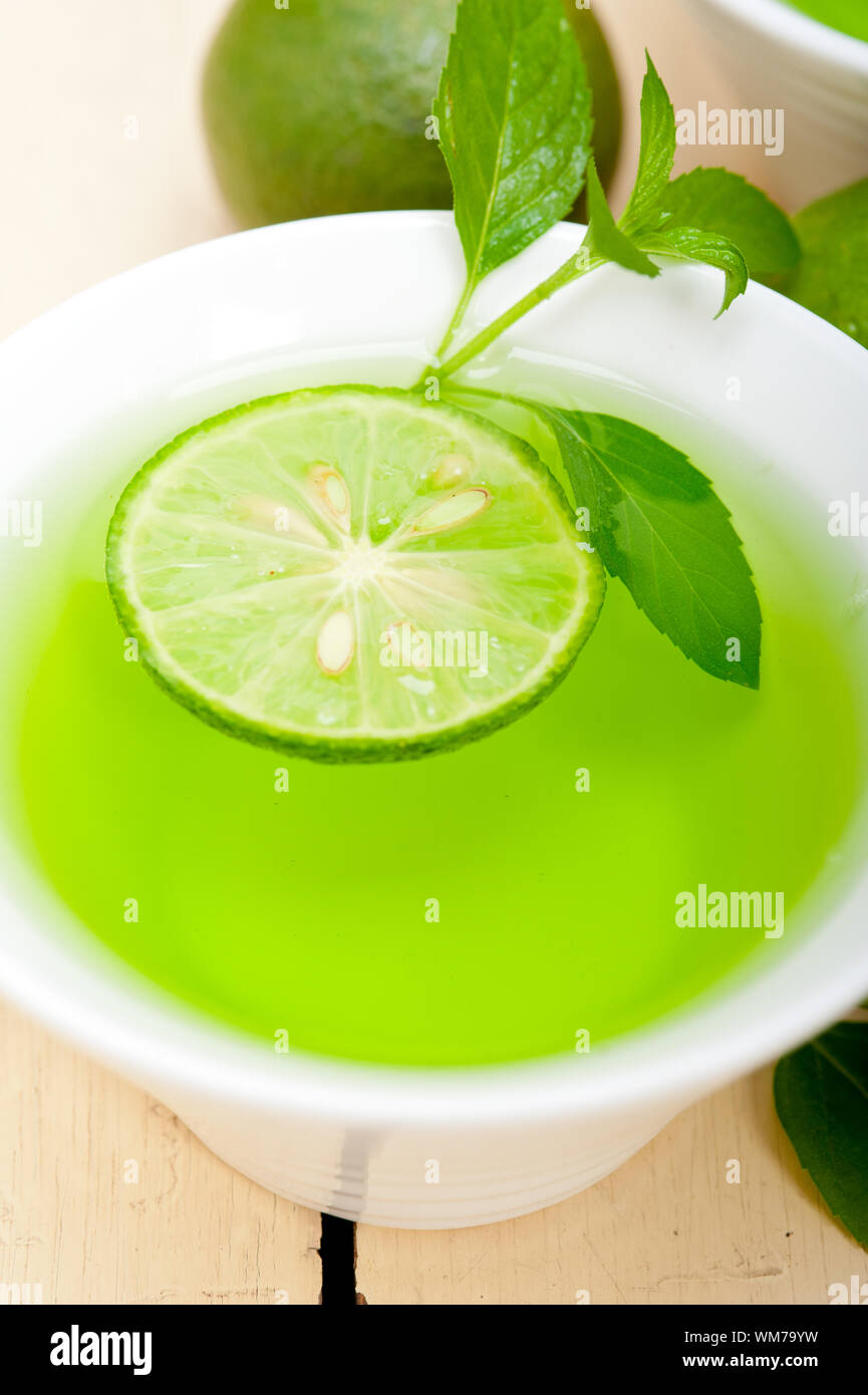 mint infusion tea tisane with lime Stock Photo - Alamy