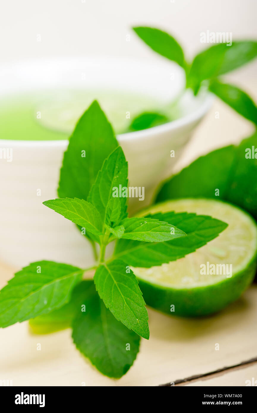 mint infusion tea tisane with lime Stock Photo - Alamy
