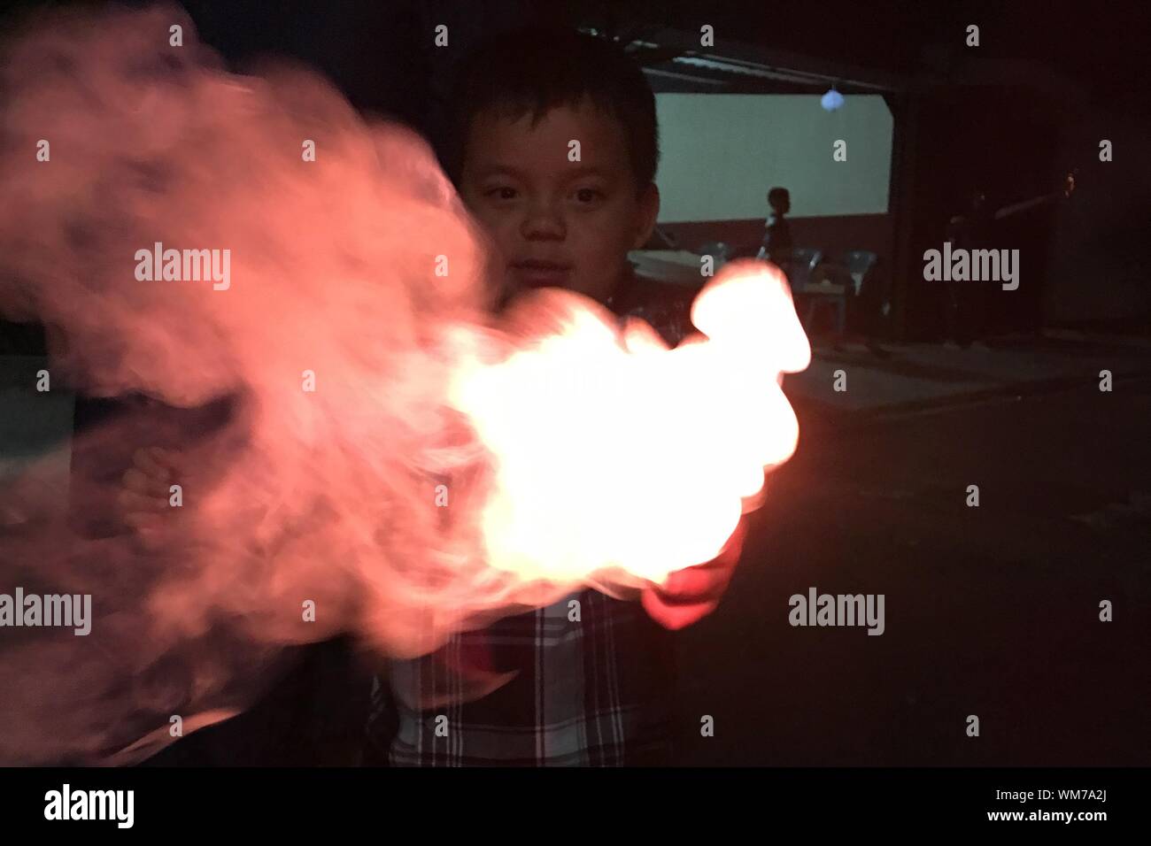 Boy Playing With Fire High Resolution Stock Photography and Images - Alamy
