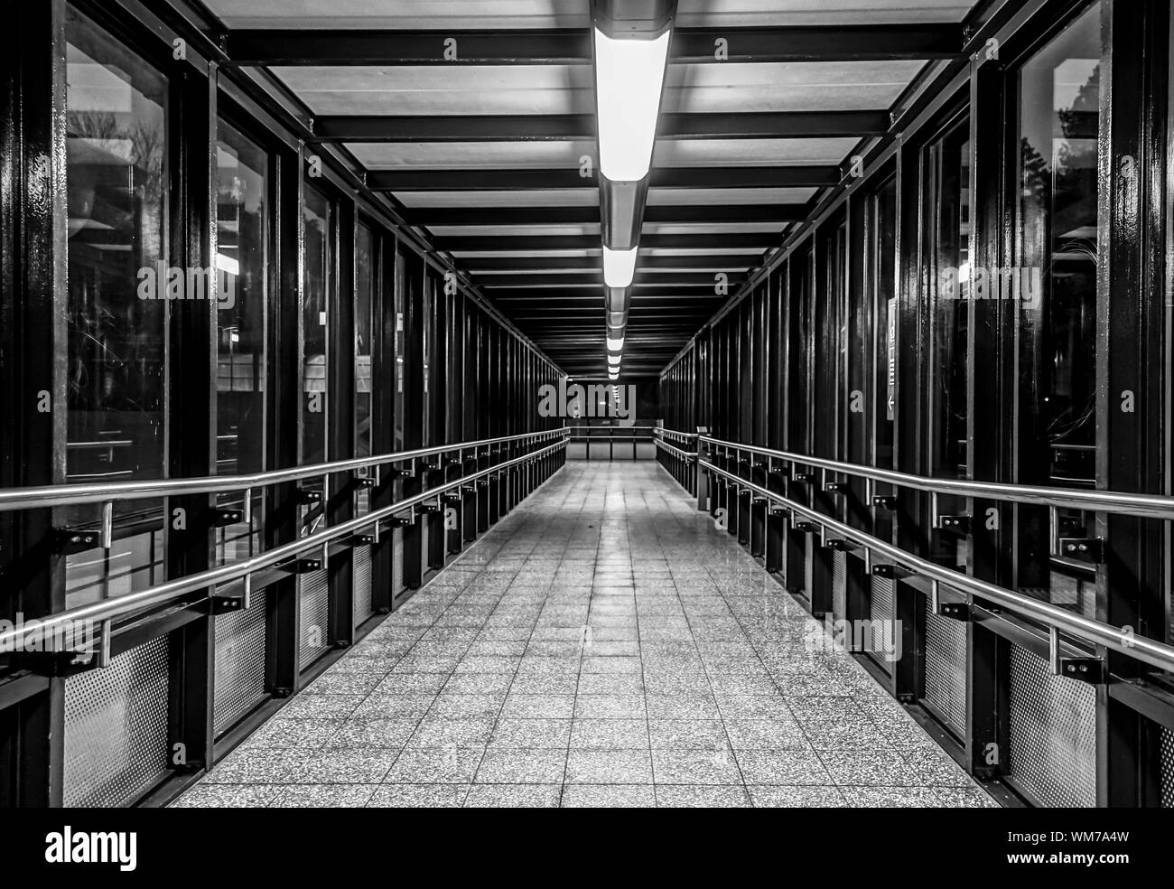 Empty passage in building building Black and White Stock Photos ...