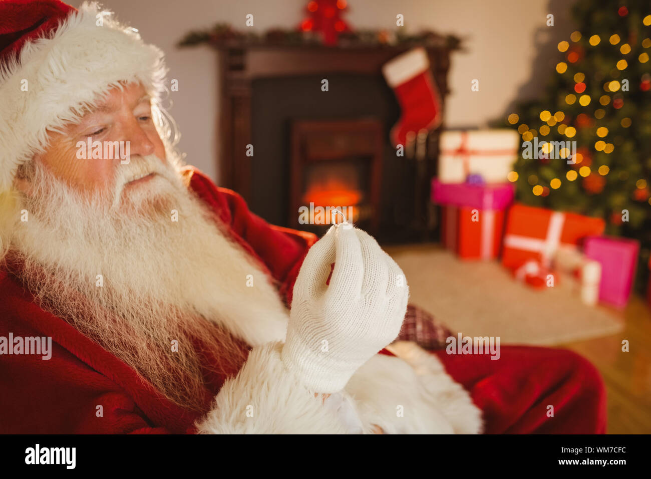 Santa claus holding engagement ring hi-res stock photography and images ...