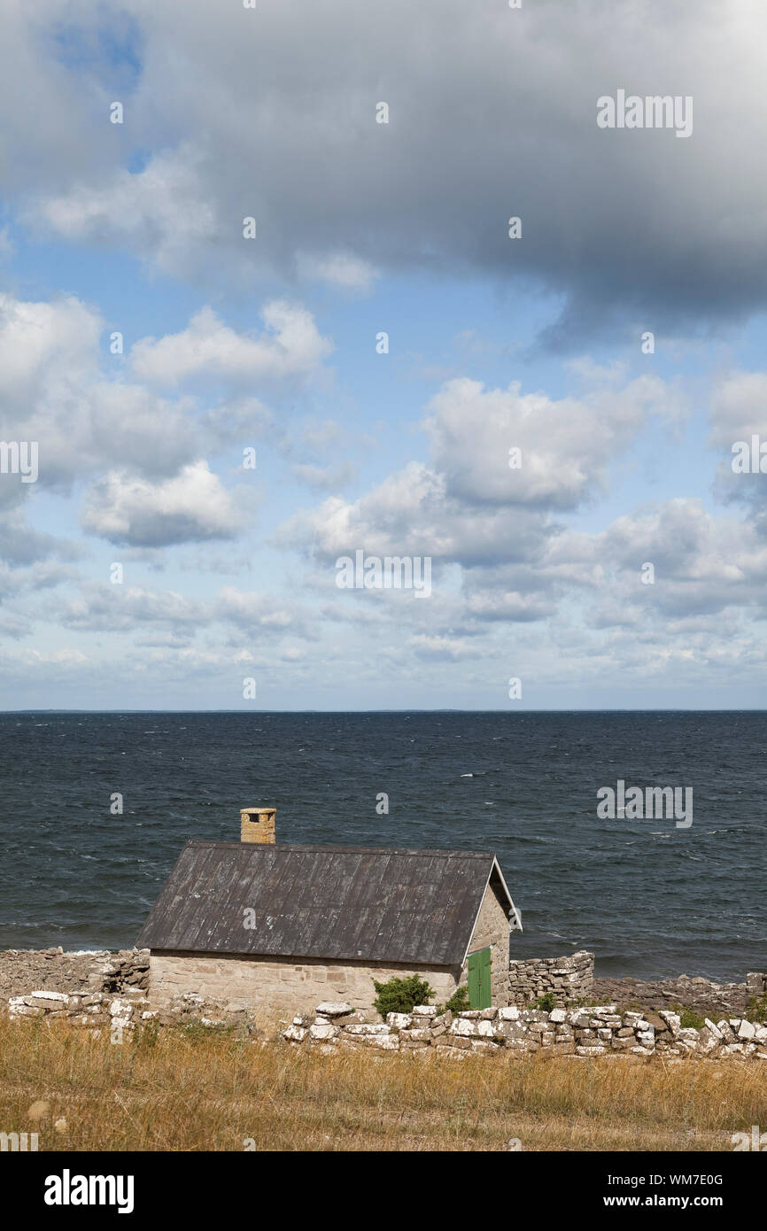 Old farmhouse by the water Stock Photo - Alamy