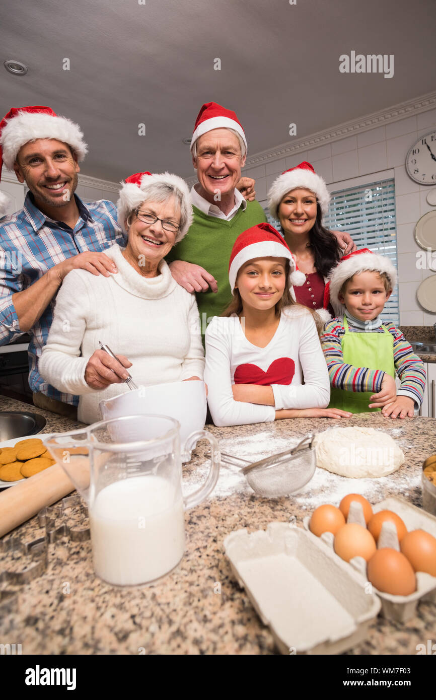 Multi-generation family baking together at home in the kitchen Stock ...