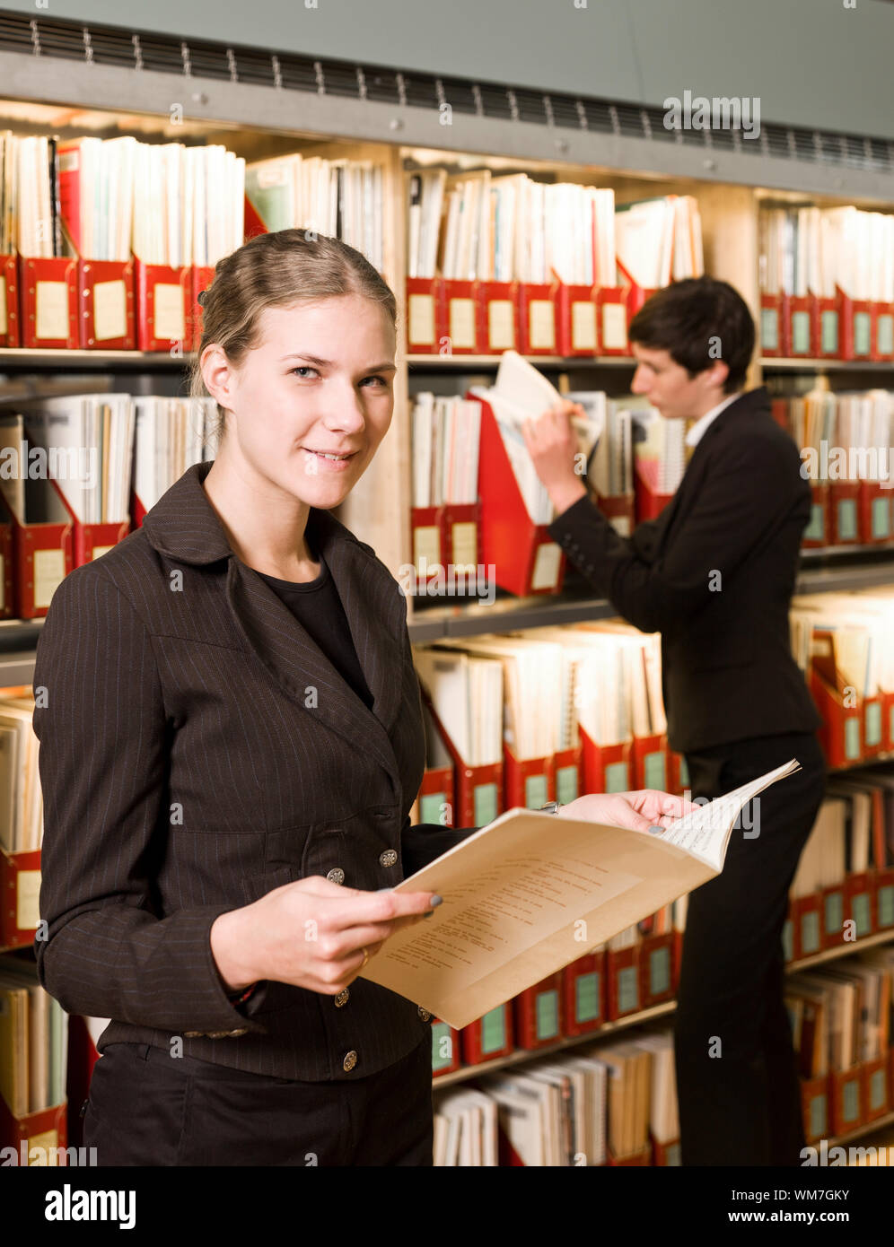 Two women at a library Stock Photo - Alamy