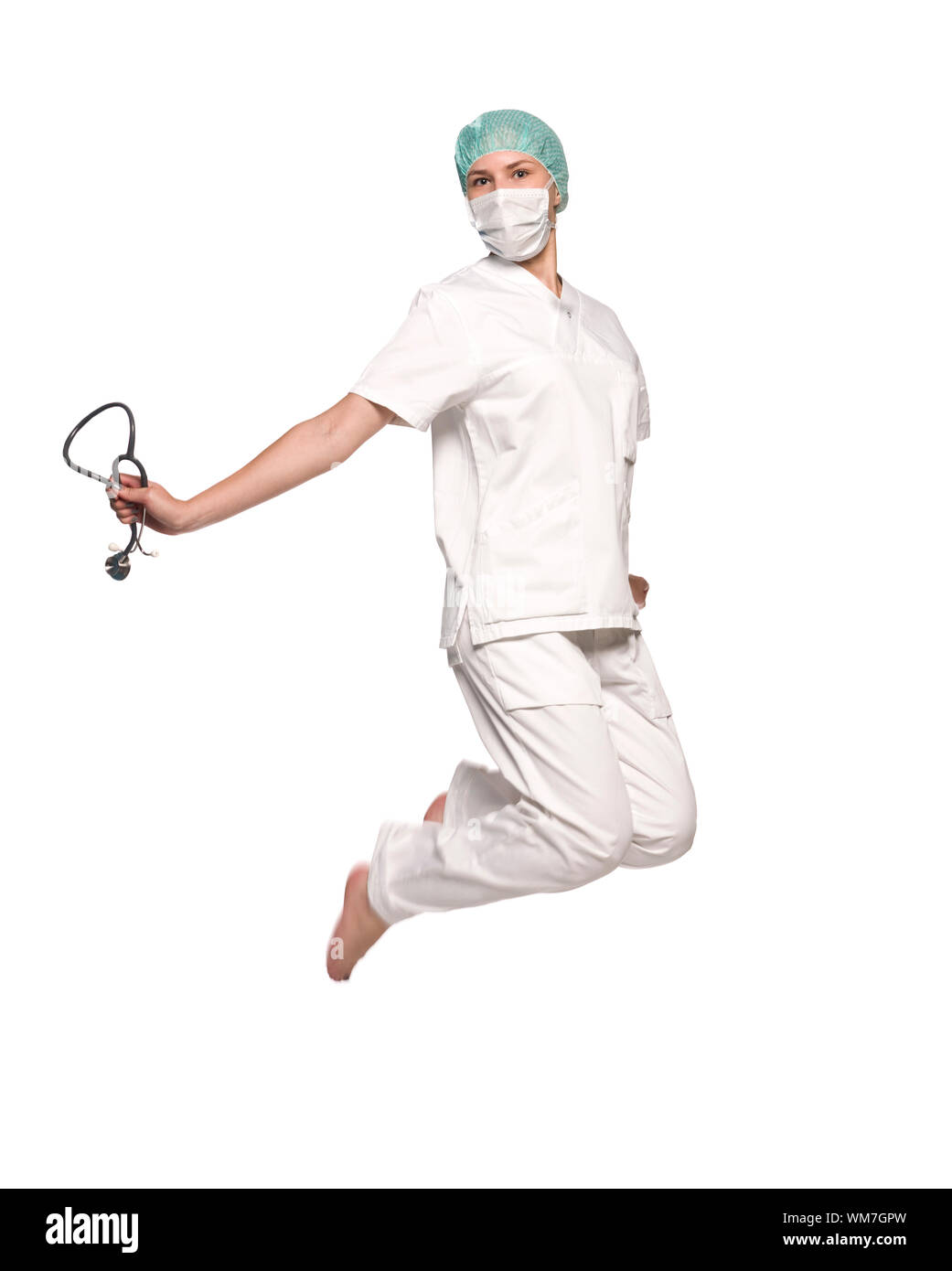 Jumping nurse with a stethoscope Stock Photo - Alamy