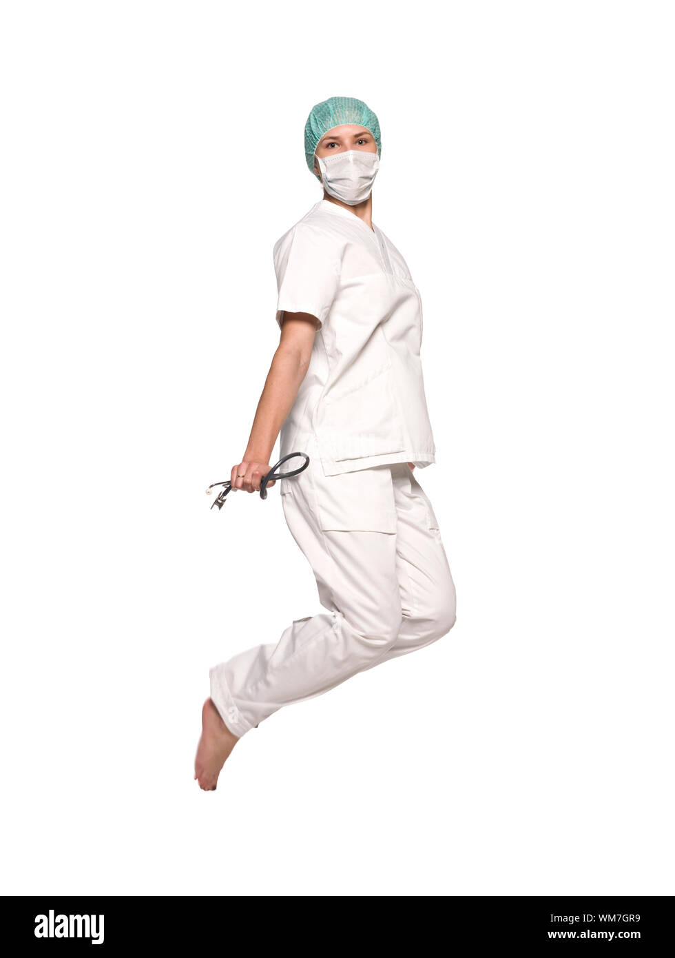 Jumping nurse with a stethoscope Stock Photo - Alamy