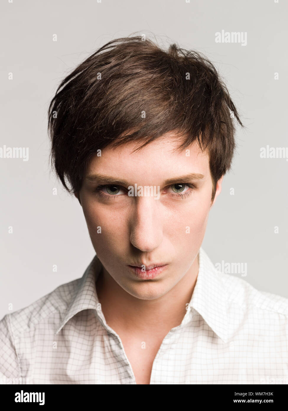 Portrait of a serious woman Stock Photo - Alamy