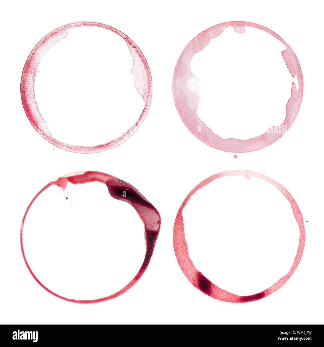 Photo of four different red wine stains from wine glasses on white ...