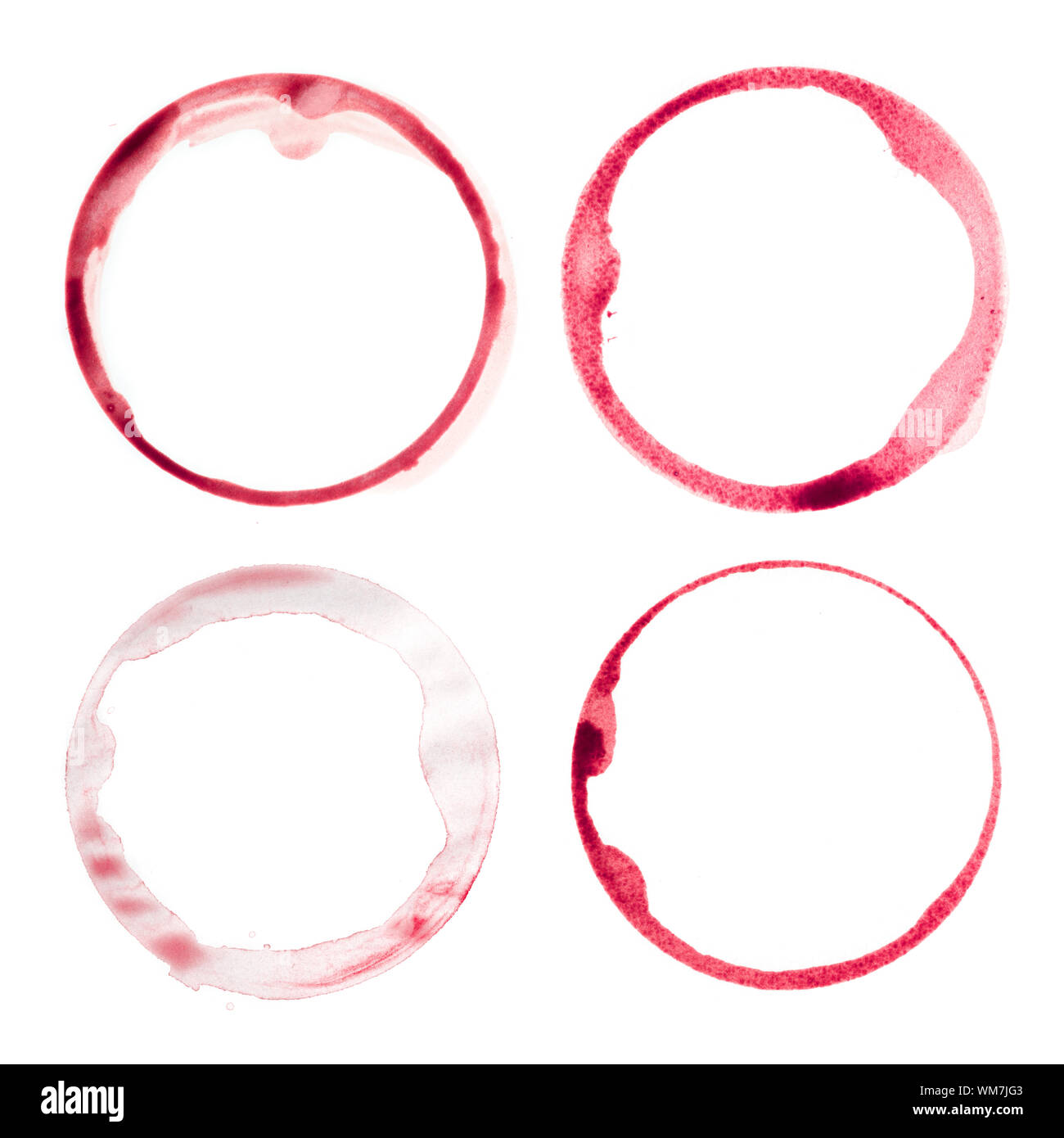 Photo of four different red wine stains from wine glasses on white ...