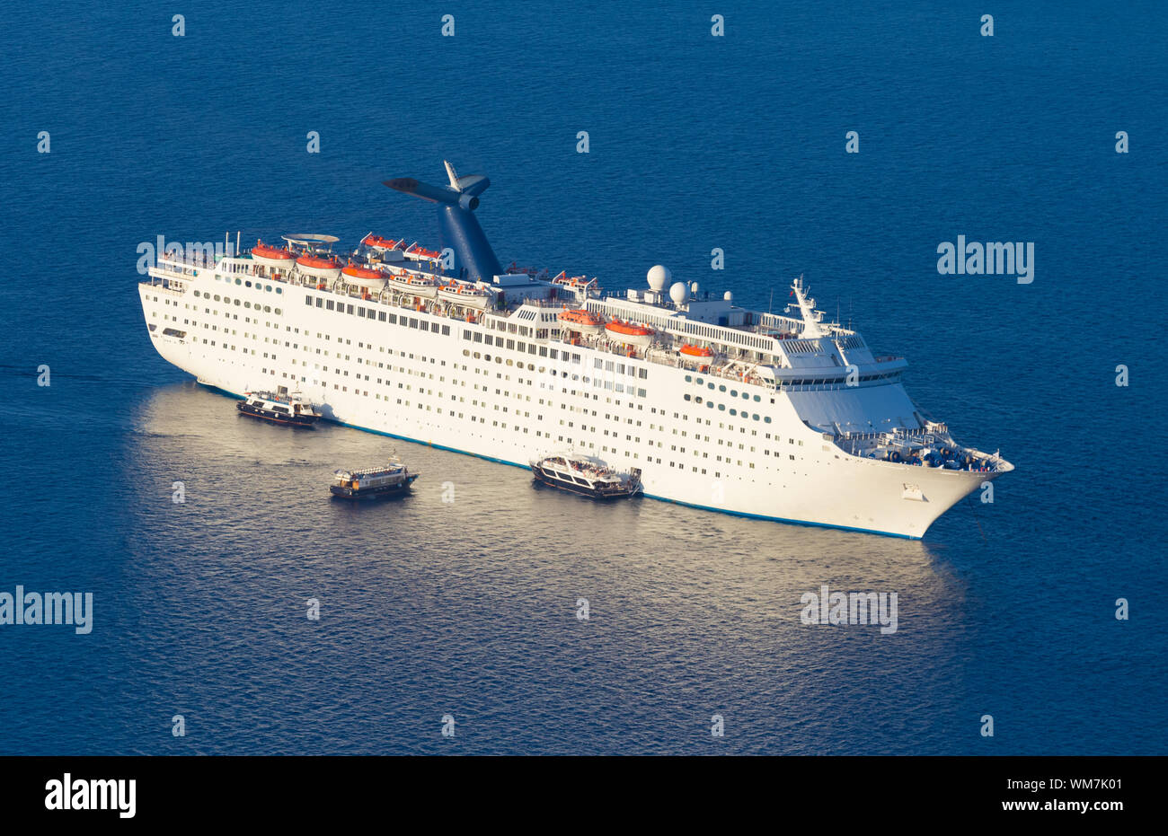 Luxury cruise ship sailing around Santorini island, Aegean sea in ...