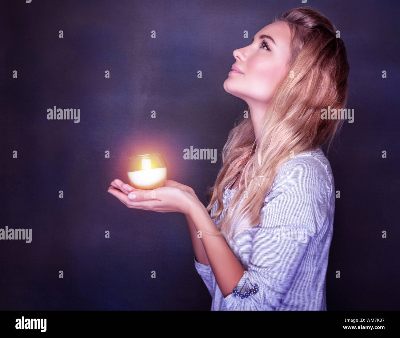 Beautiful girl praying Stock Photo - Alamy