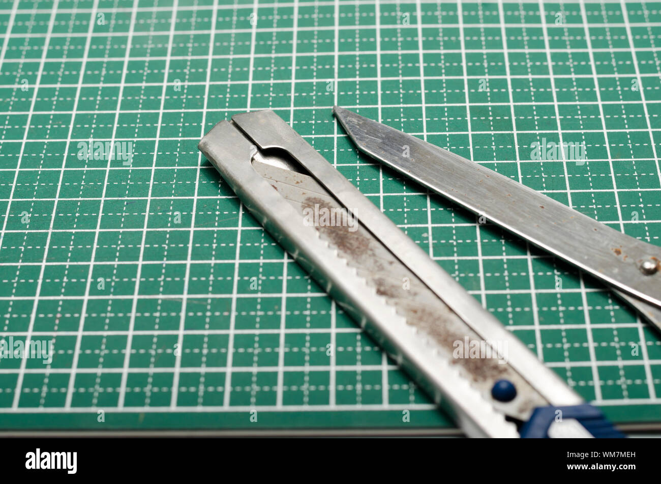 tools on cutting mat Stock Photo - Alamy