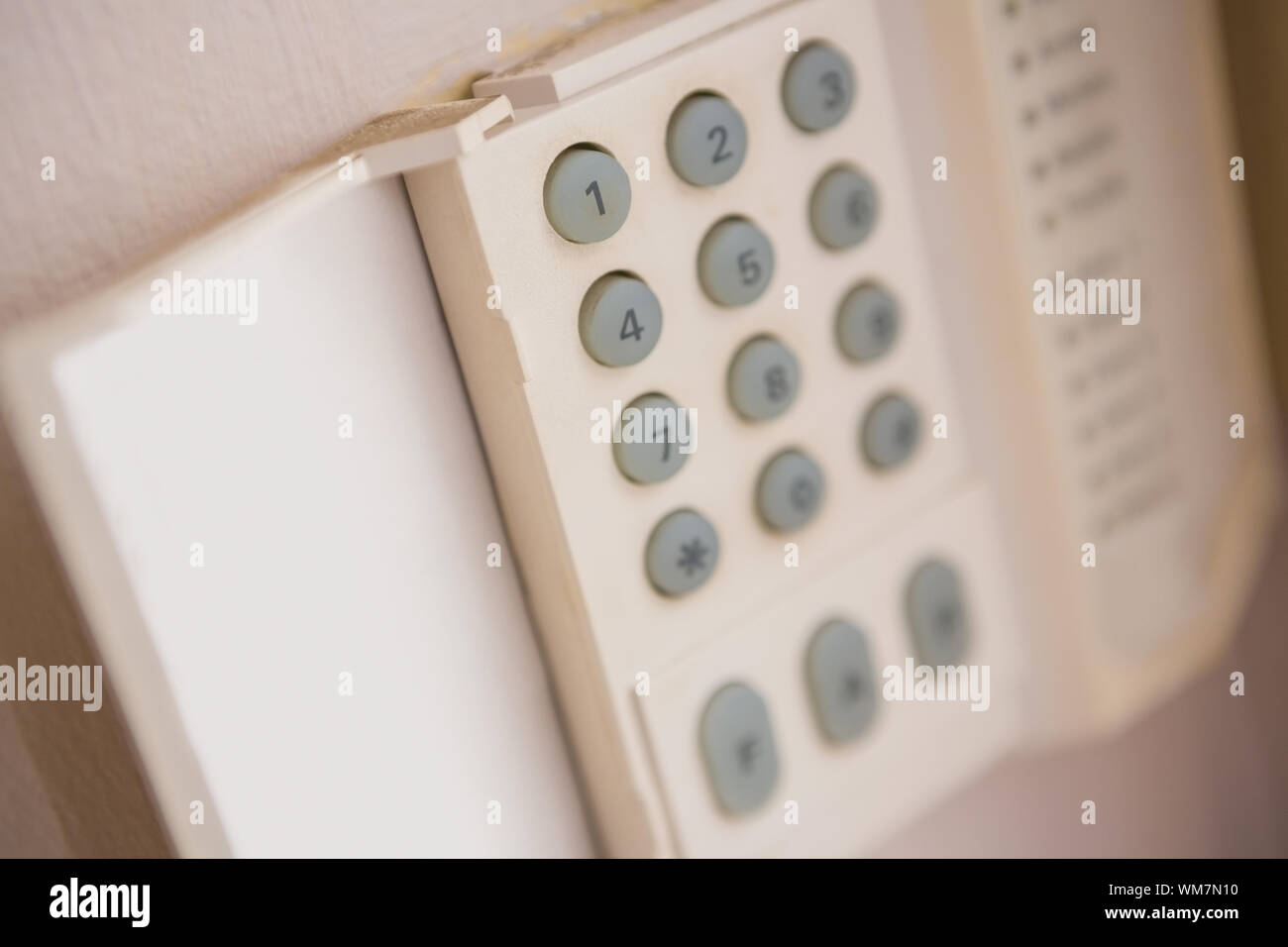 Close up of home security keypad on the wall Stock Photo - Alamy