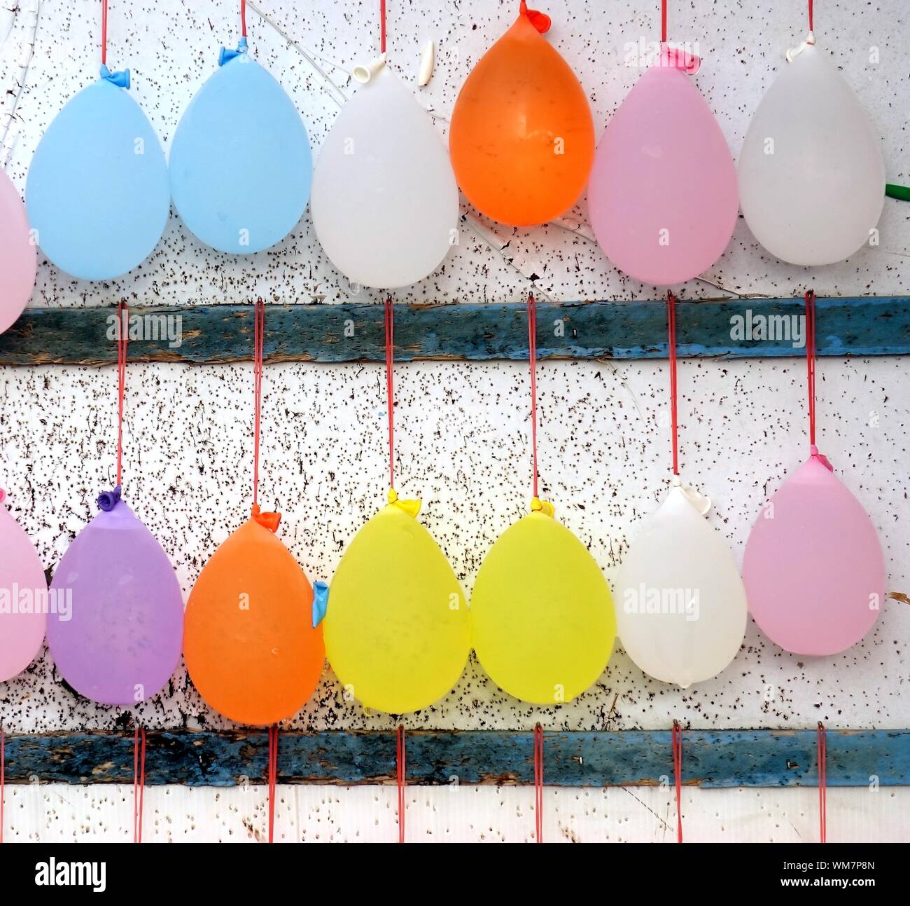 Colorful Balloons Hanging In Rows Stock Photo - Alamy