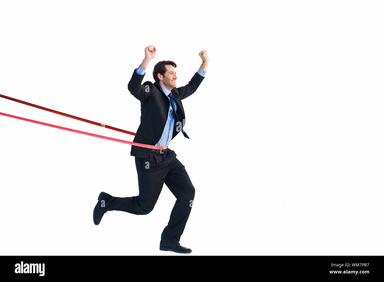 Businessman smiling and crossing the line on white background Stock ...