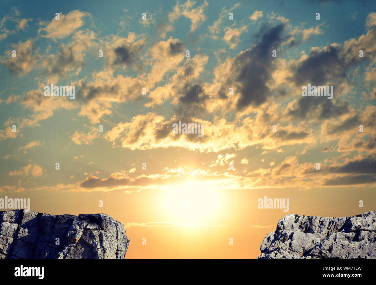 Gap in rocky pathway or chasm between two rocks. Sunrise sky as ...
