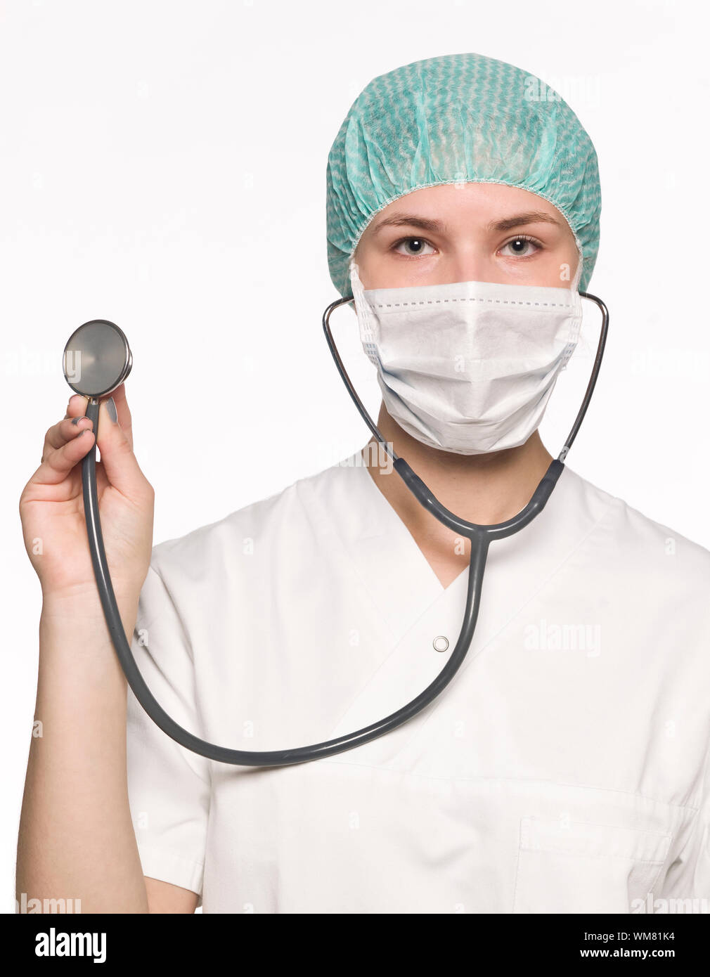 Female nurse with a stethoscope isolated towards white background Stock ...