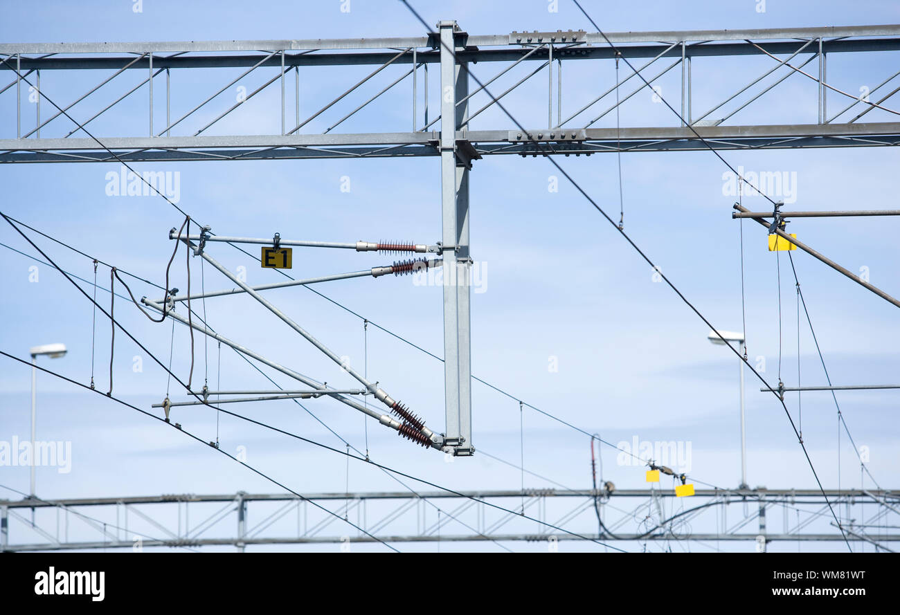 Train Power Cables towards Blue sky Full Frame Stock Photo - Alamy