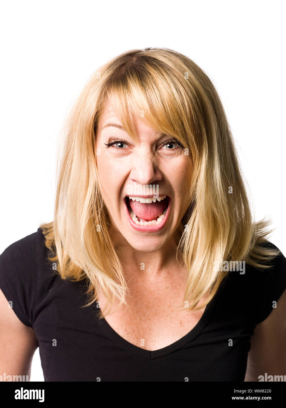 Portrait of a screaming woman Stock Photo - Alamy