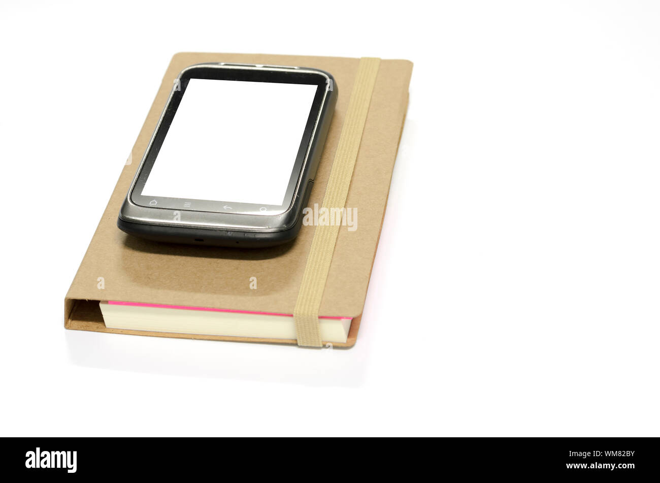 used smartphone with note book Stock Photo - Alamy