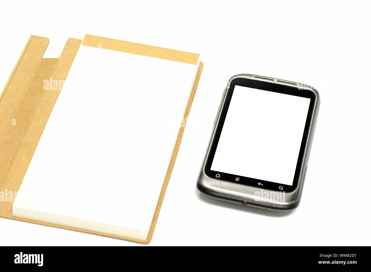 used smartphone with note book Stock Photo - Alamy