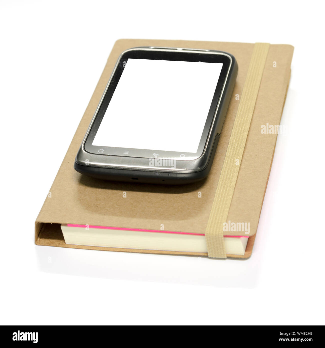 used smartphone with note book on a white background Stock Photo - Alamy