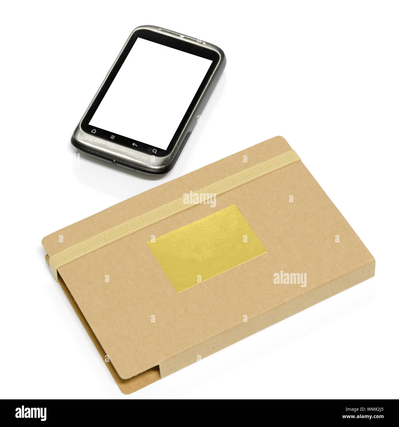 used smartphone with note book Stock Photo - Alamy